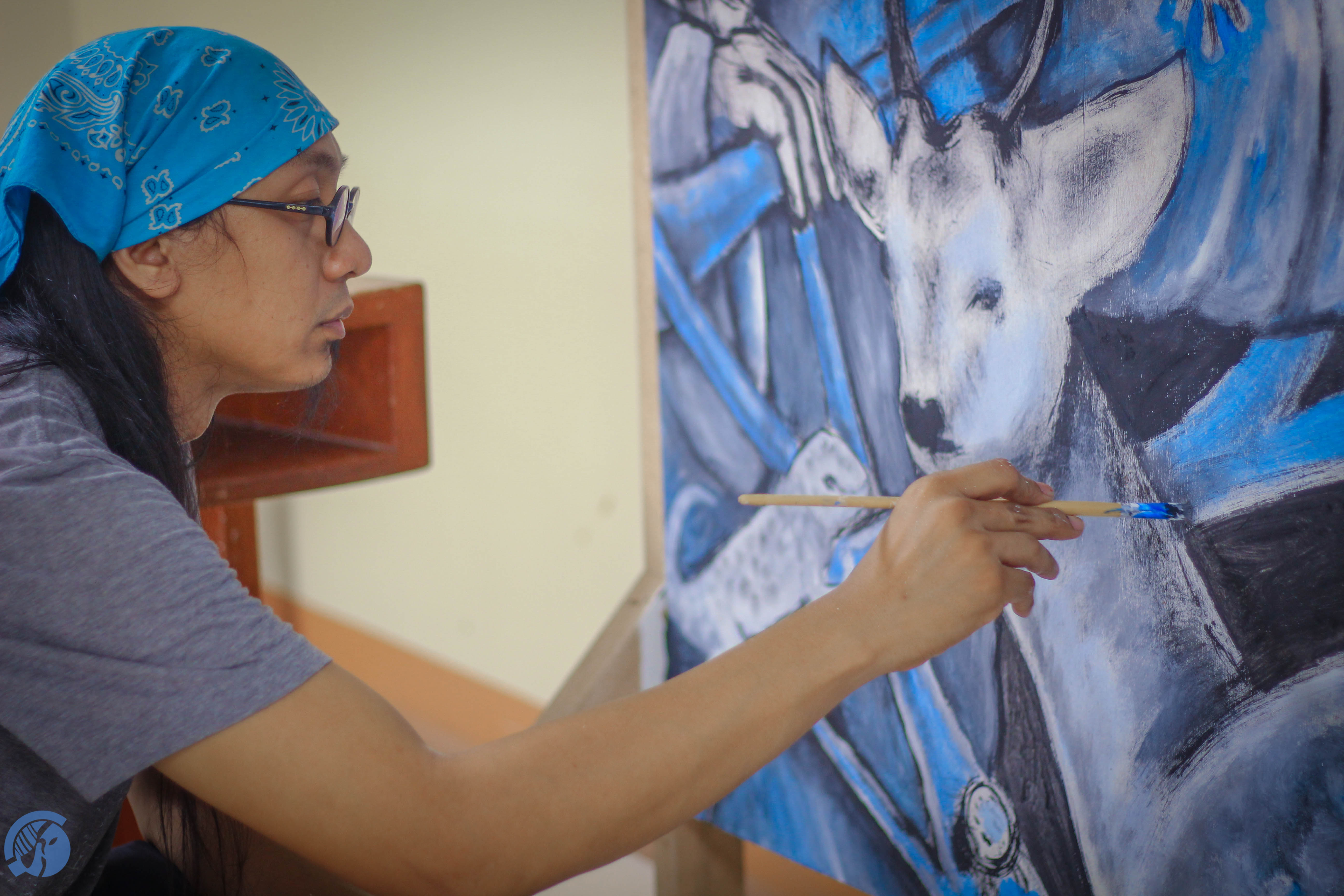 Environmentalist's mural painting raises awareness